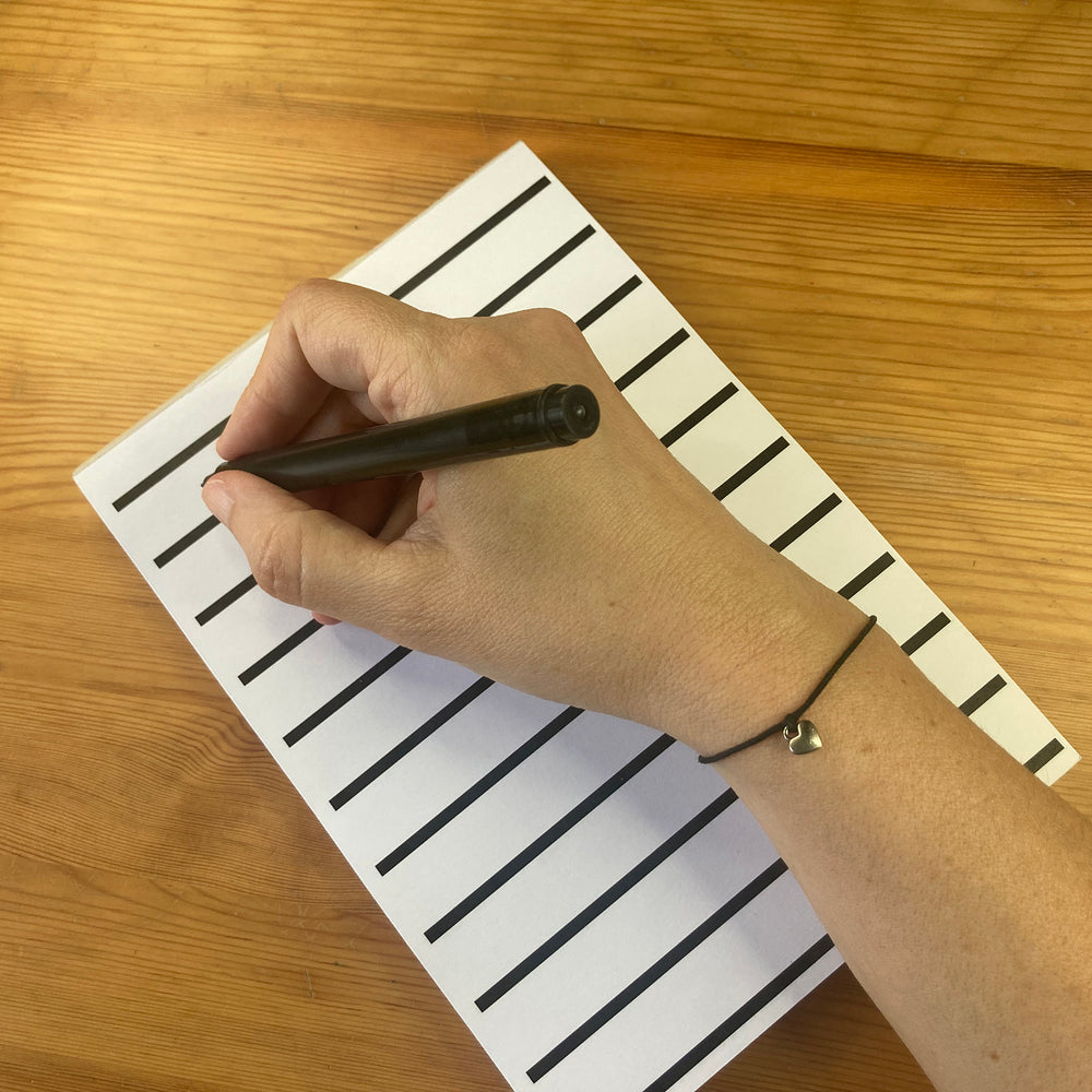 RNIB A5 white writing pad, lines 1.9cm apart